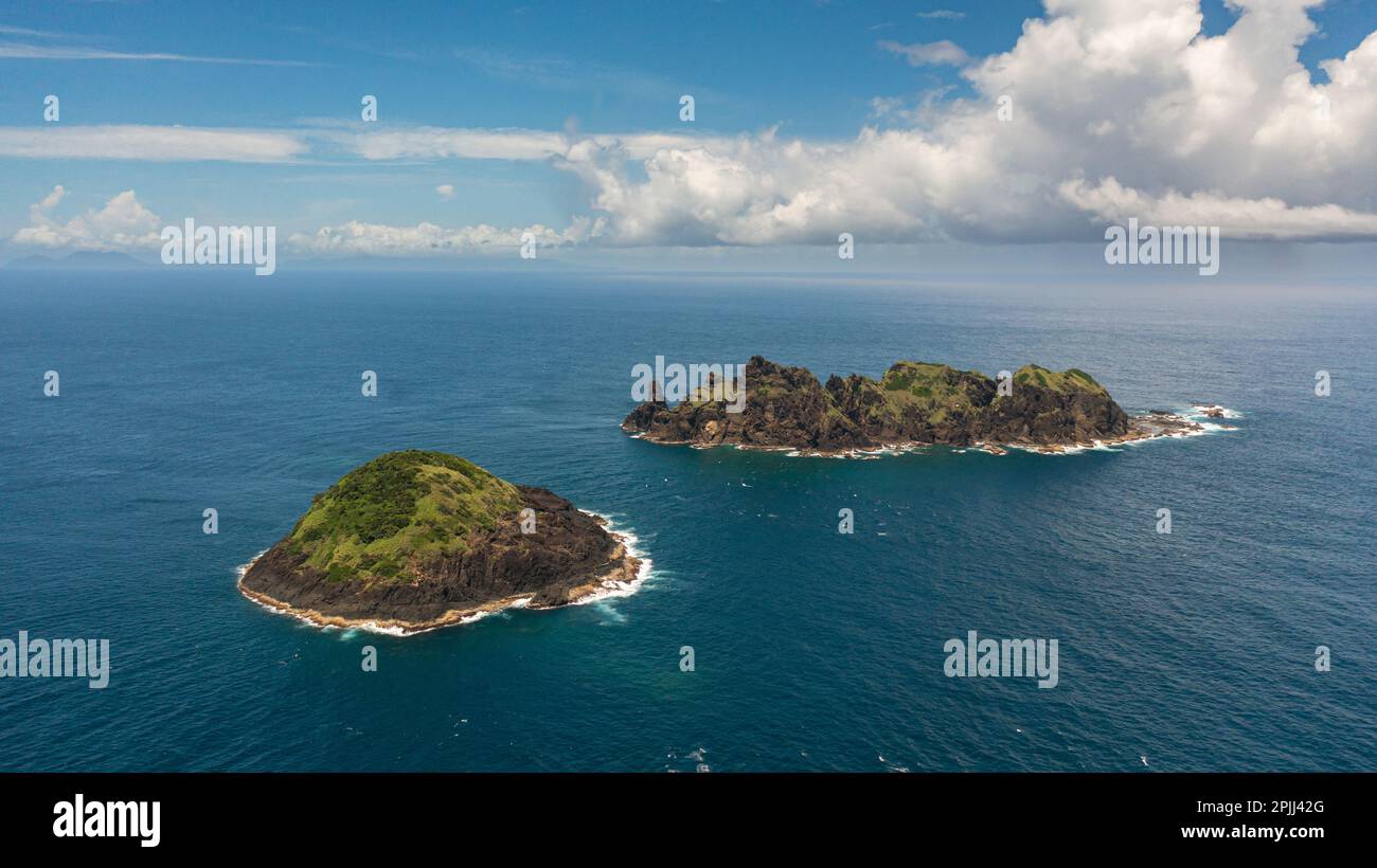 Top view of rocky tropical island in the blue ocean. Dos Hermanos ...