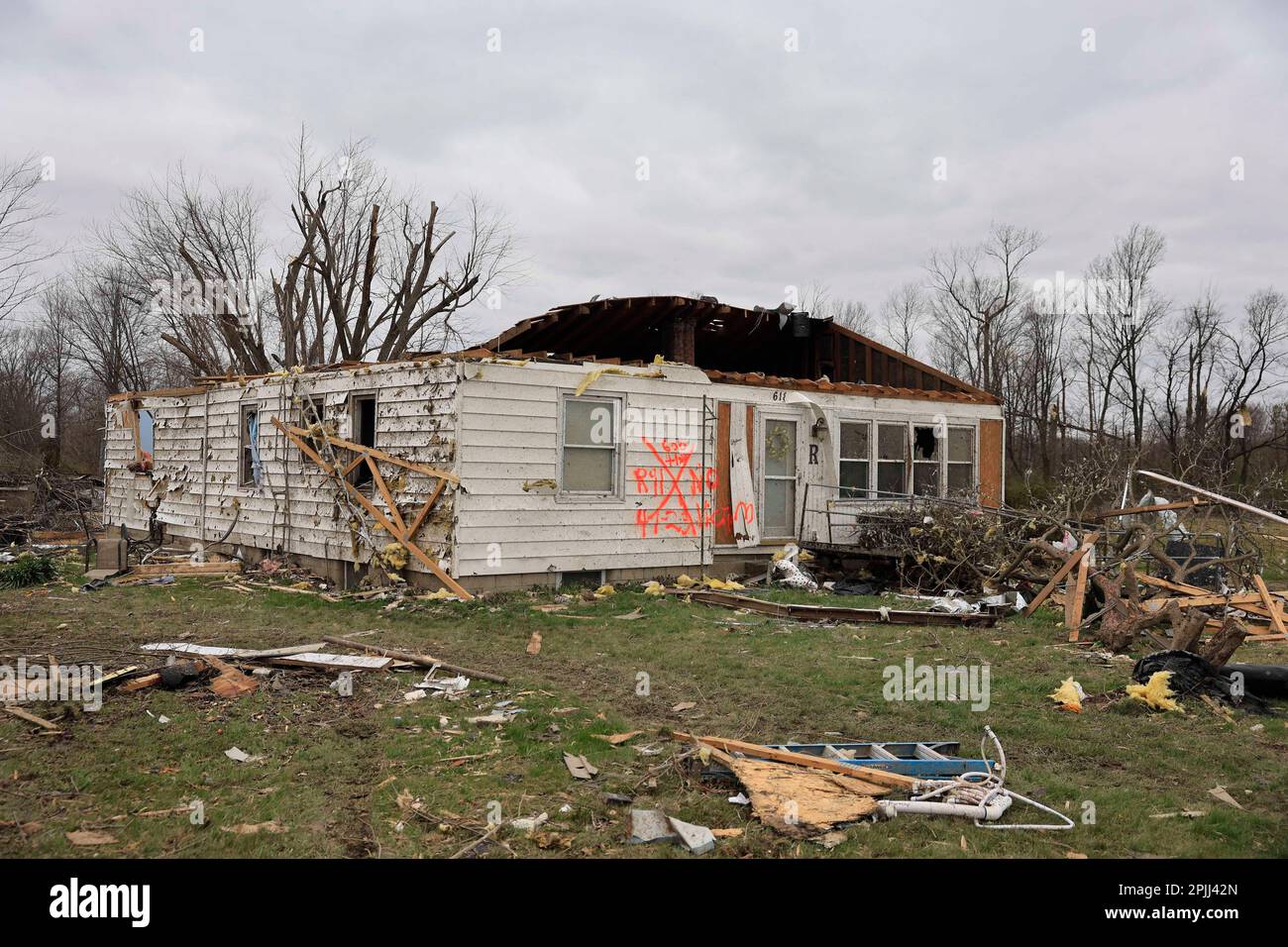 SULLIVAN, INDIANA - APRIL 1: A house is marked with an x after a ...