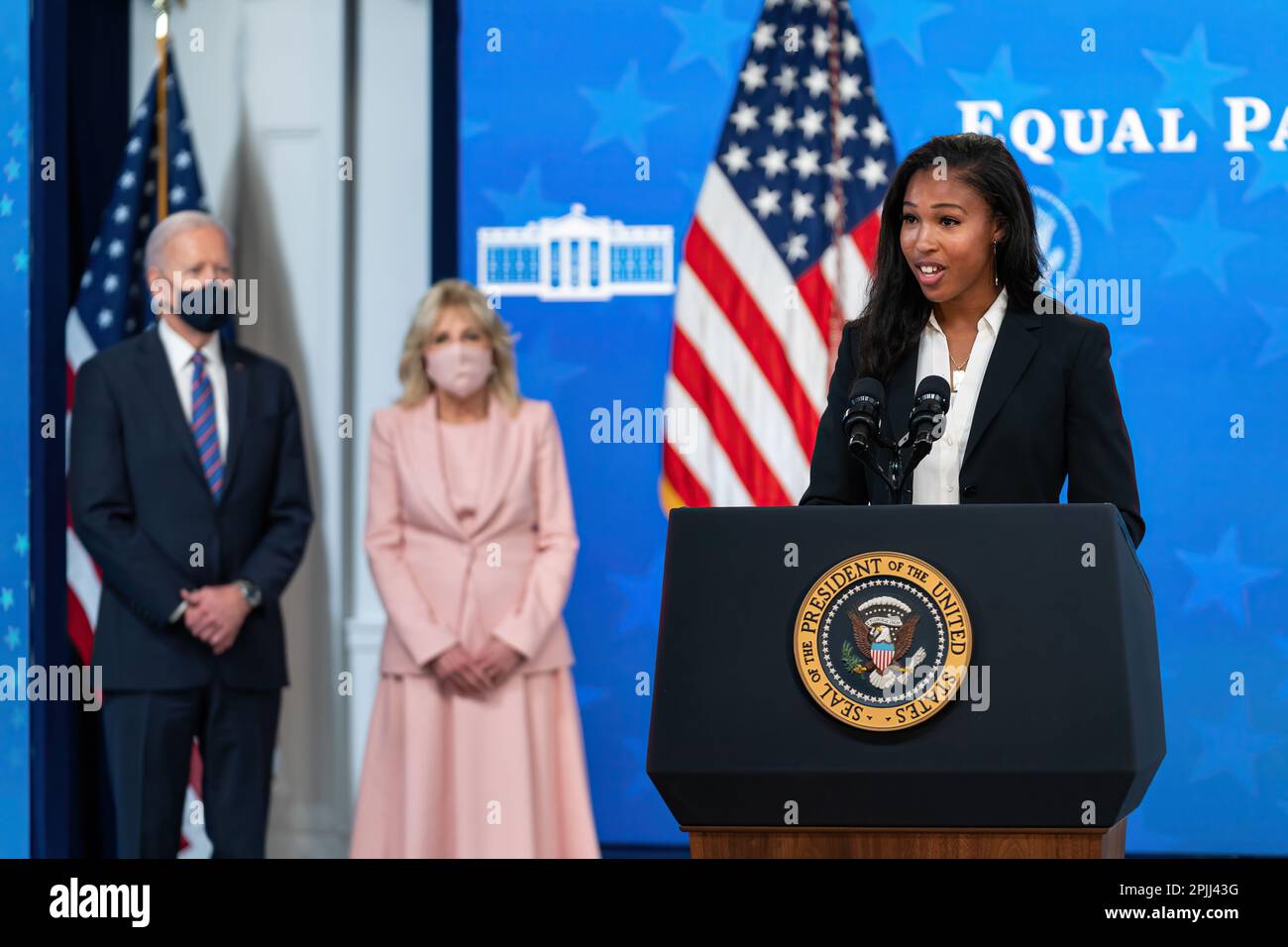 President Joe Biden and First Lady Jill Biden listen as soccer player ...