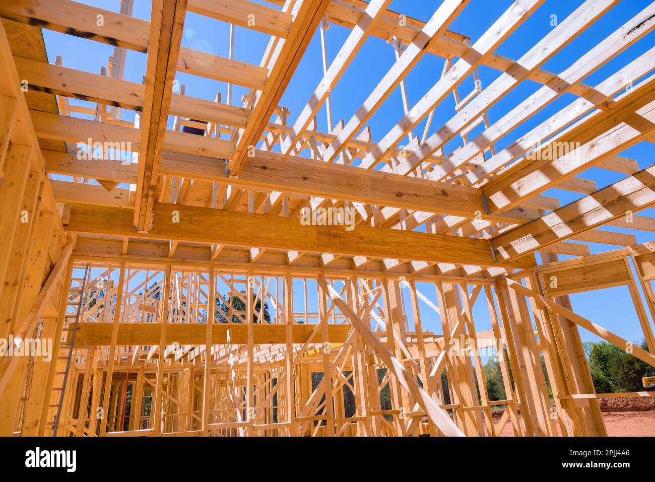 New house construction with wooden beams the ceiling and wall system ...