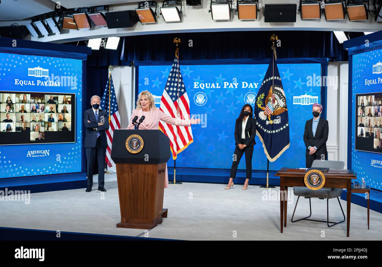 President Joe Biden and U.S. Women’s National soccer players Megan ...