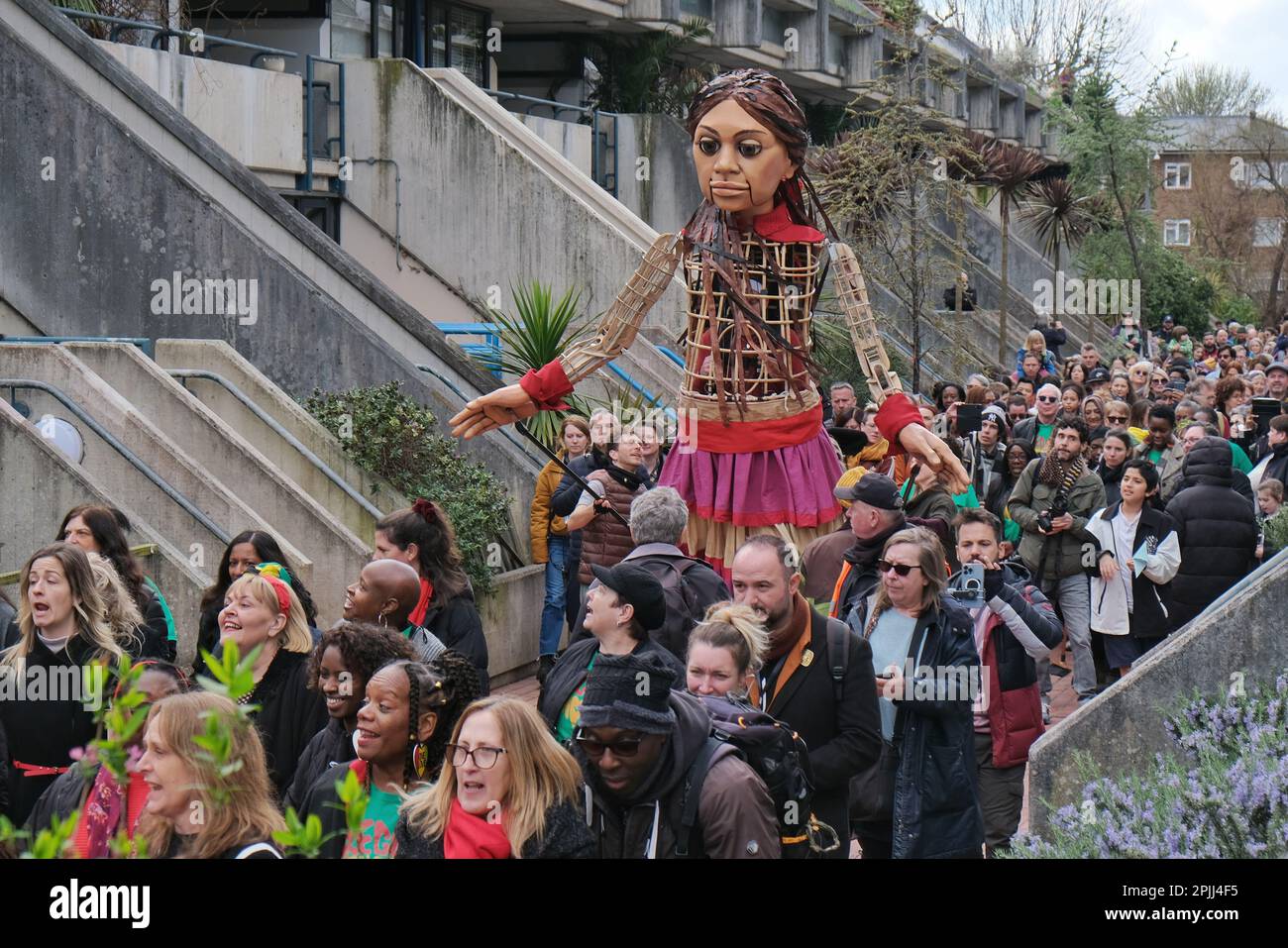 London, UK. 2nd April, 2023. Little Amal, a 12-foot tall puppet of a ...