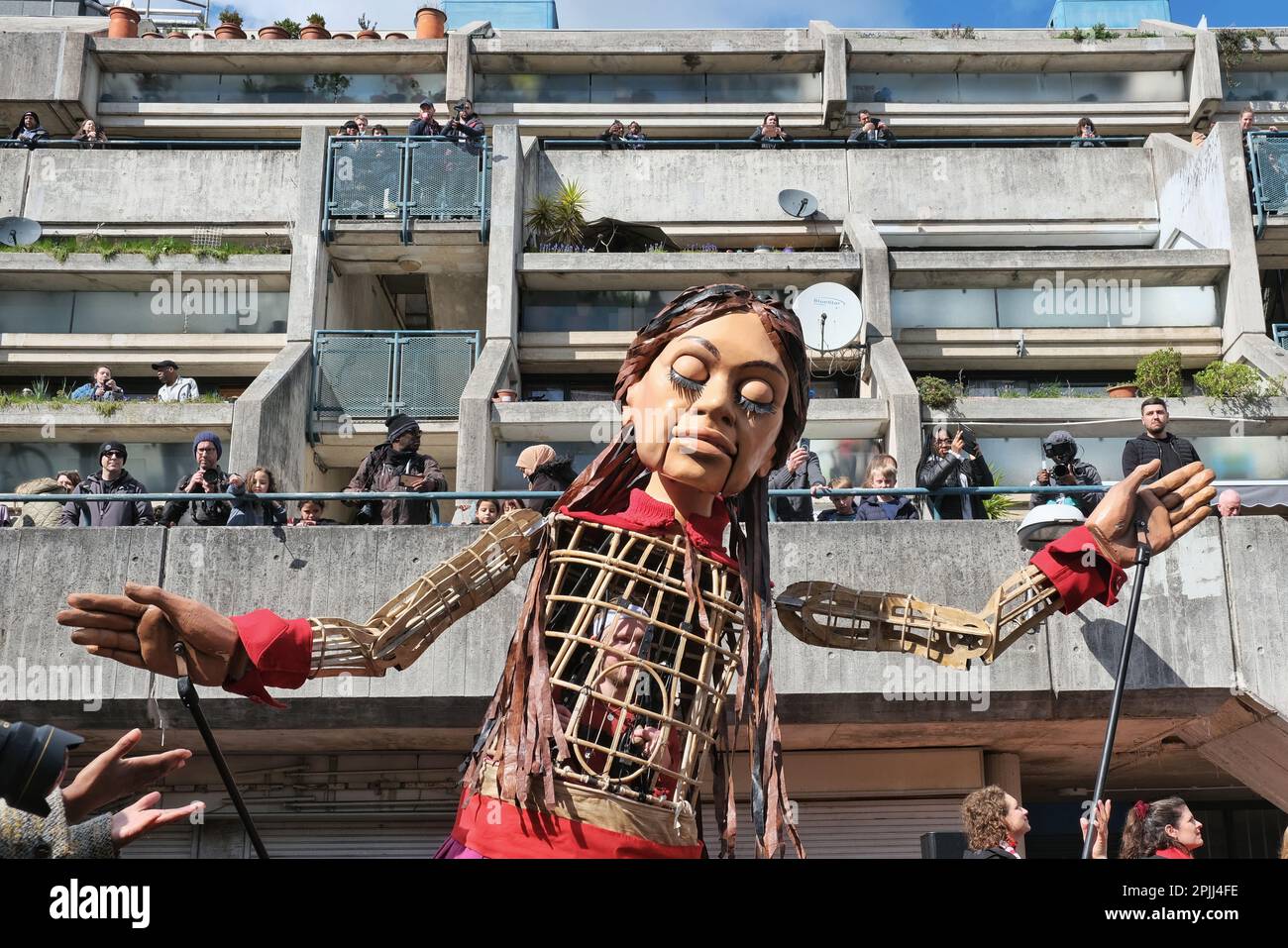 London, UK. 2nd April, 2023. Little Amal, a 12-foot tall puppet of a ...