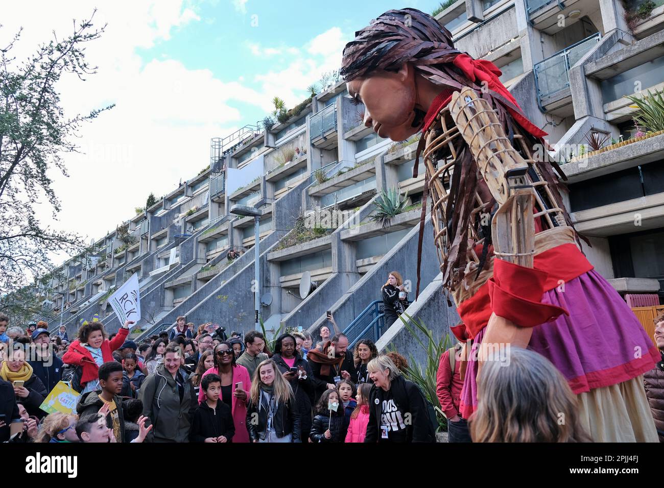 London, UK. 2nd April, 2023. Little Amal, a 12-foot tall puppet of a ...
