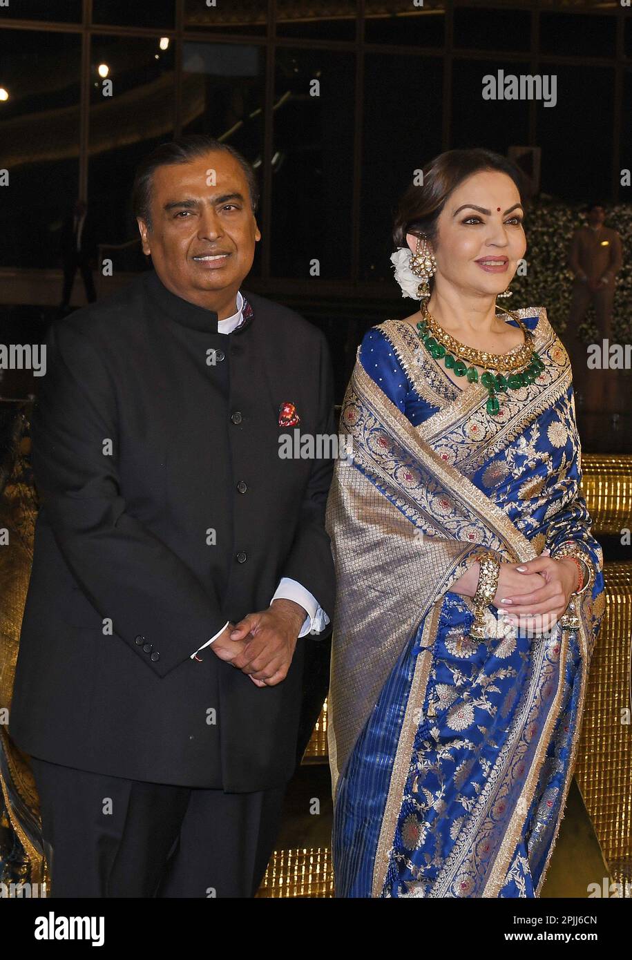 Mumbai, India. 31st Mar, 2023. L-R Indian billionaire businessman Mukesh Ambani and his ...