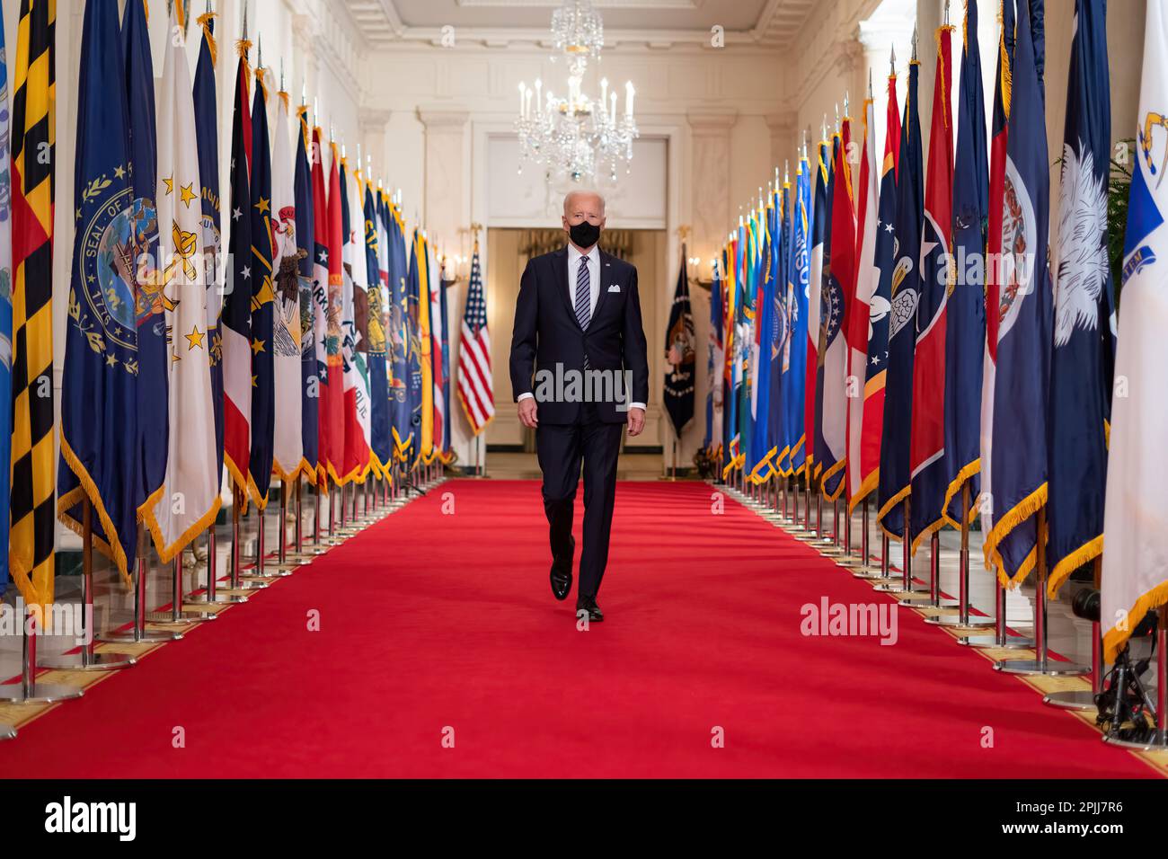 President Joe Biden walks from the State Dining Room of the White House ...
