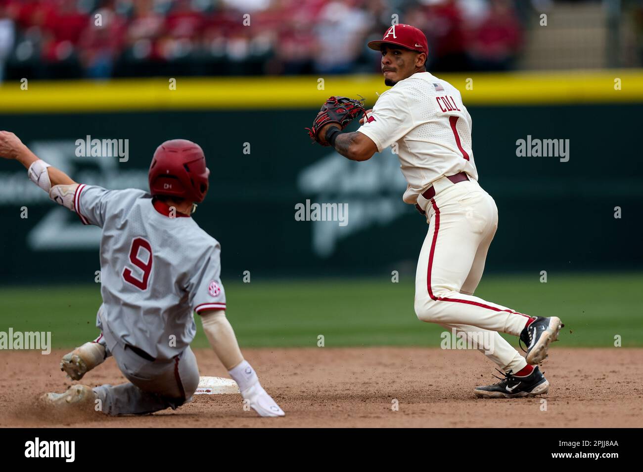 April 2, 2023: Arkansas short stop Harold Coll #1 attempts to finish ...