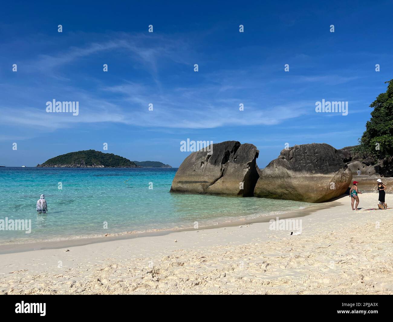 Similan Islands, Thailand. 05th Feb, 2023. People linger on the beach ...