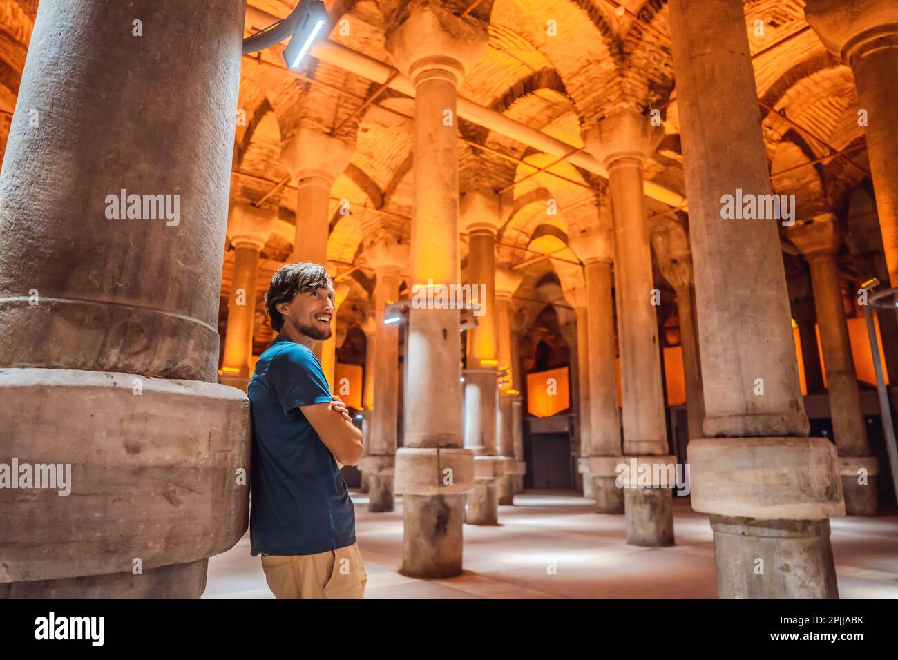 Man tourist enjoying Beautiful cistern in Istanbul. Cistern ...