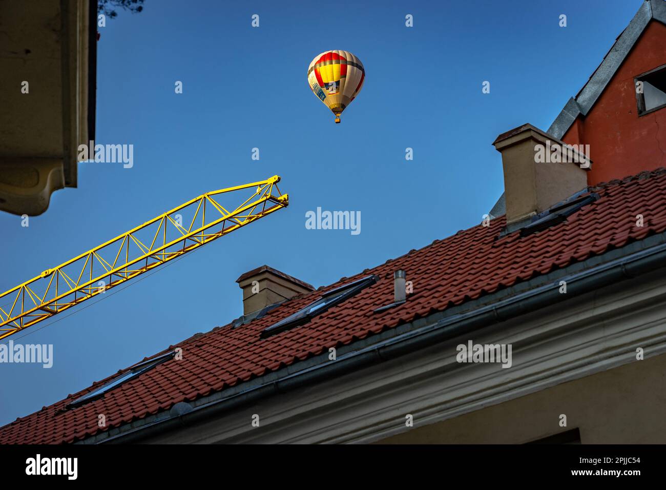 Vilnius, Lithuania - Hot air balloon over the Old Town buildings Stock ...