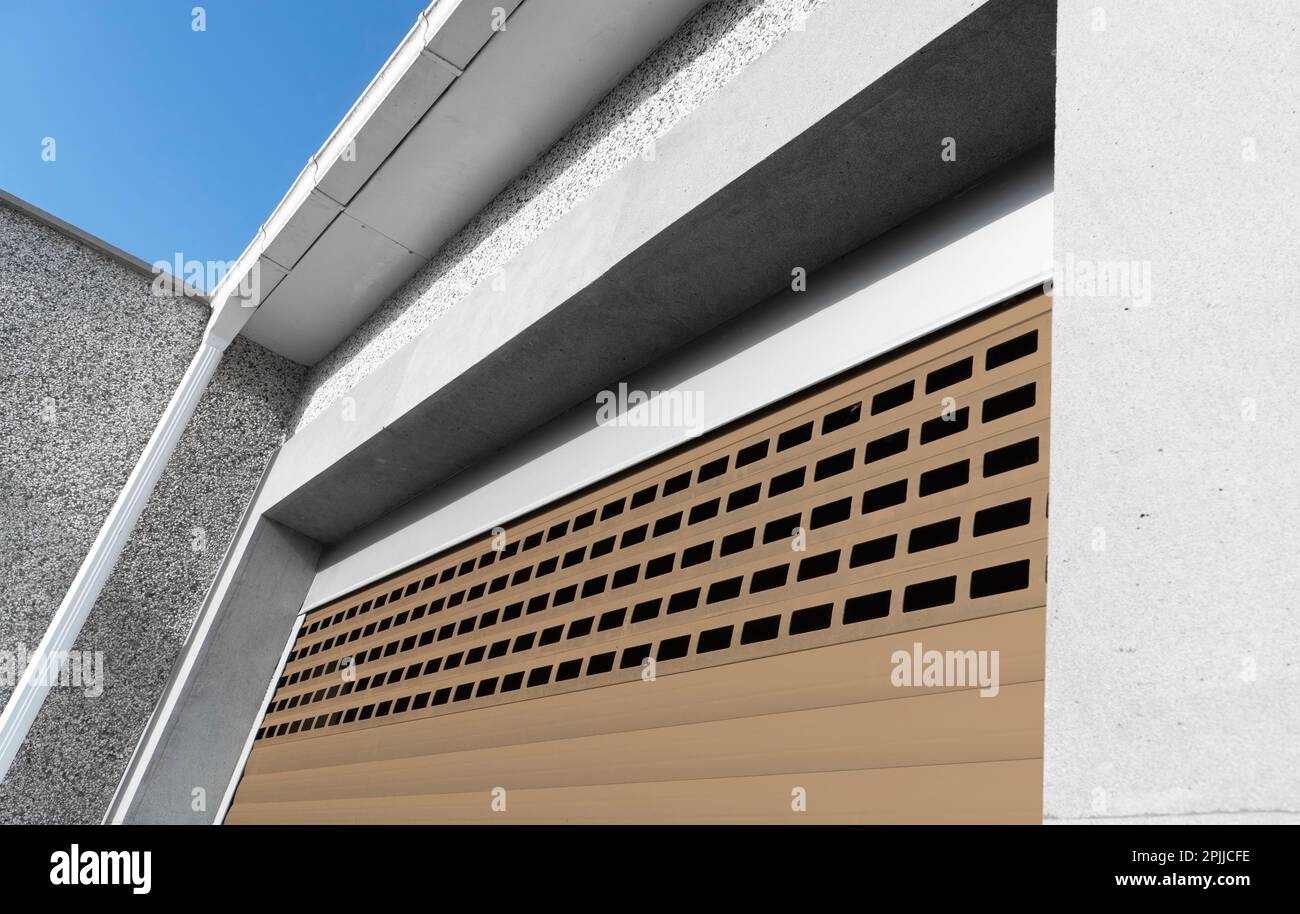 Roller shutter gate. Metal roller garage door as background. Automatic ...