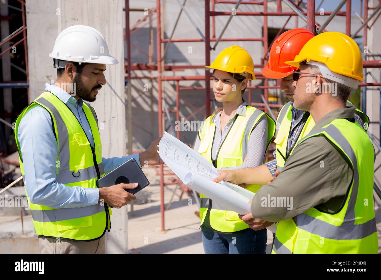 Team group of contractor and architect with foreman explaining about ...