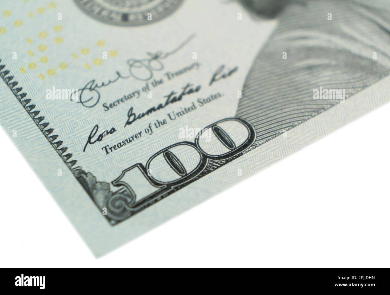 Macro shot image of the corner of a 100 dollar bill banknotes. Concept ...