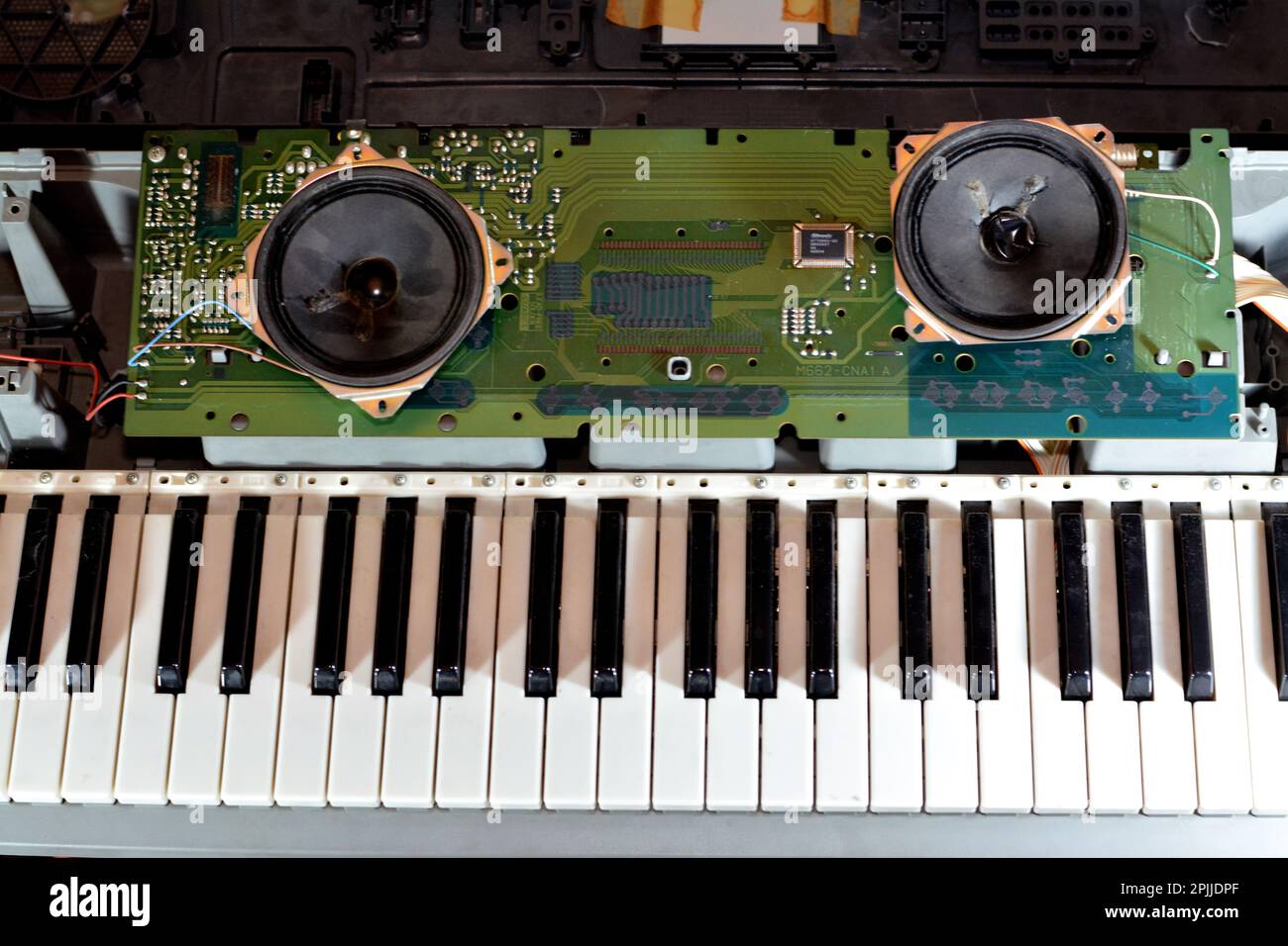 Cairo, Egypt, April 1 2023: Broken electronic musical keyboard, cracked ...