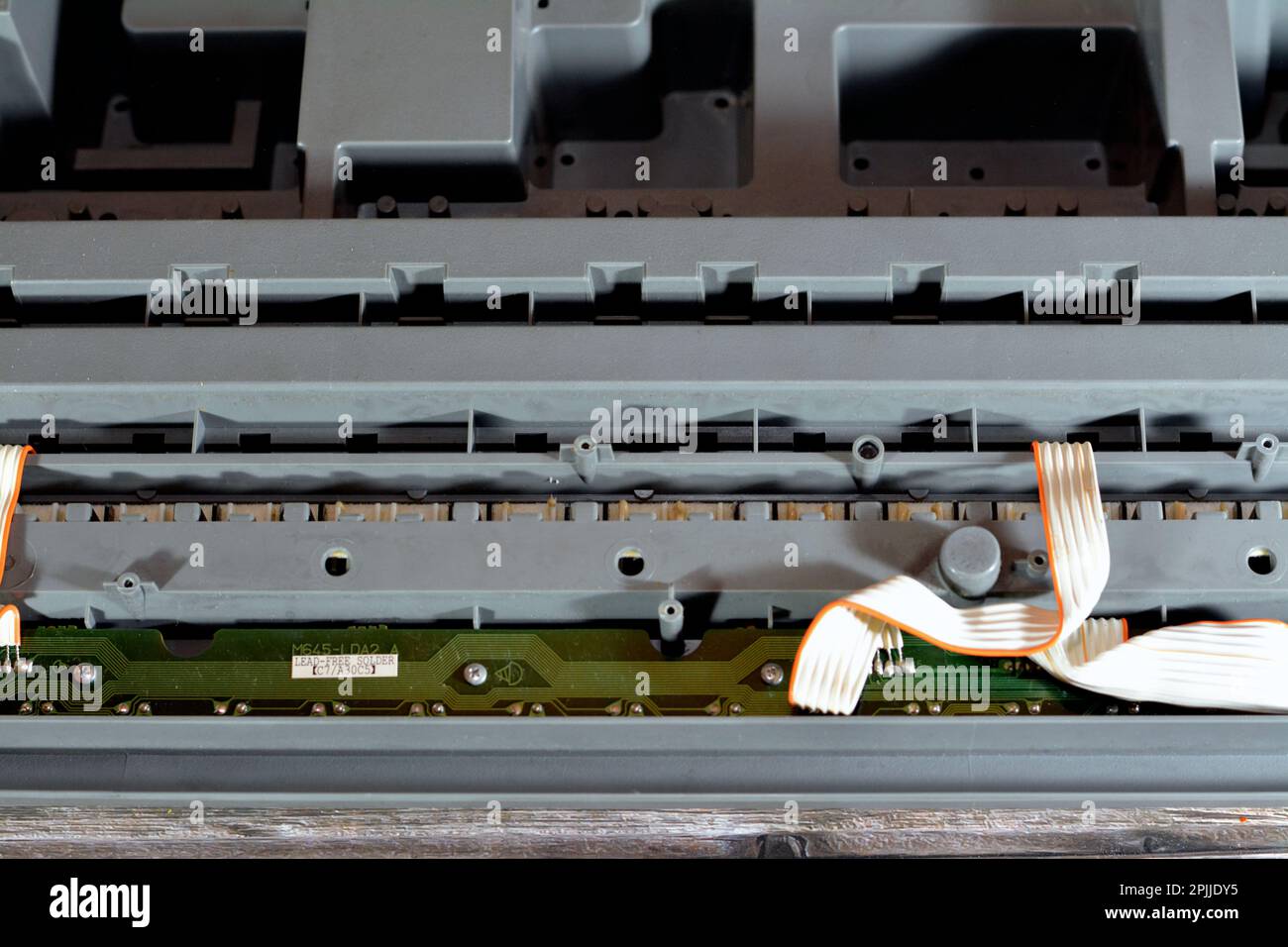 Cairo, Egypt, April 1 2023: Broken electronic musical keyboard, cracked ...