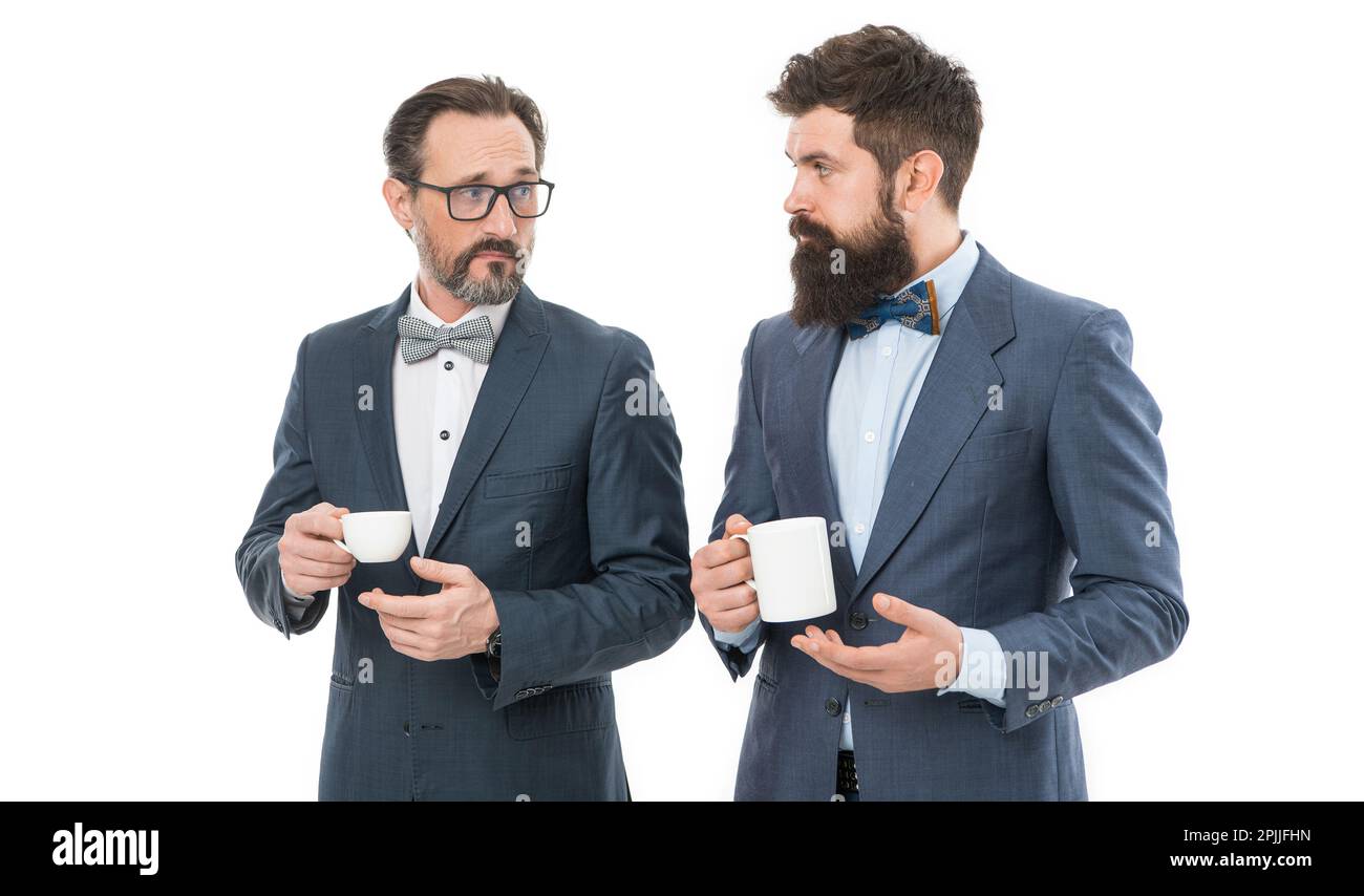 Small talk. Men bearded guys communicate while relaxing coffee break ...