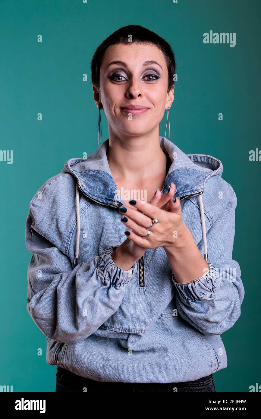 Excited woman clapping hands over hi-res stock photography and images ...