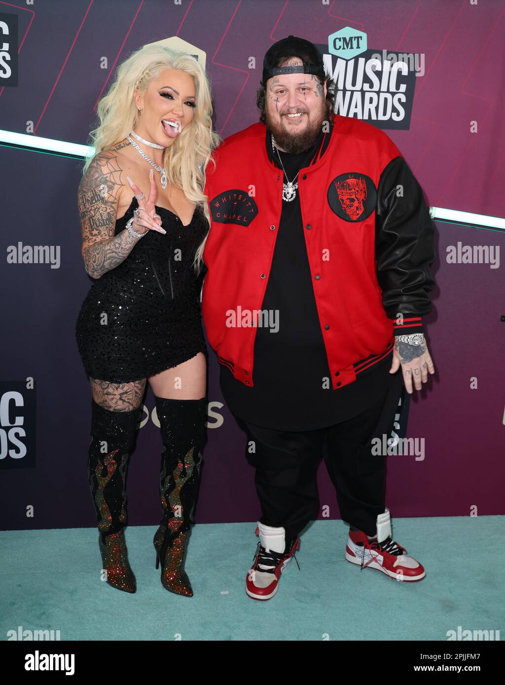 Jelly Roll and Bunnie DeFord arriving at the 2023 CMT Music Awards held ...
