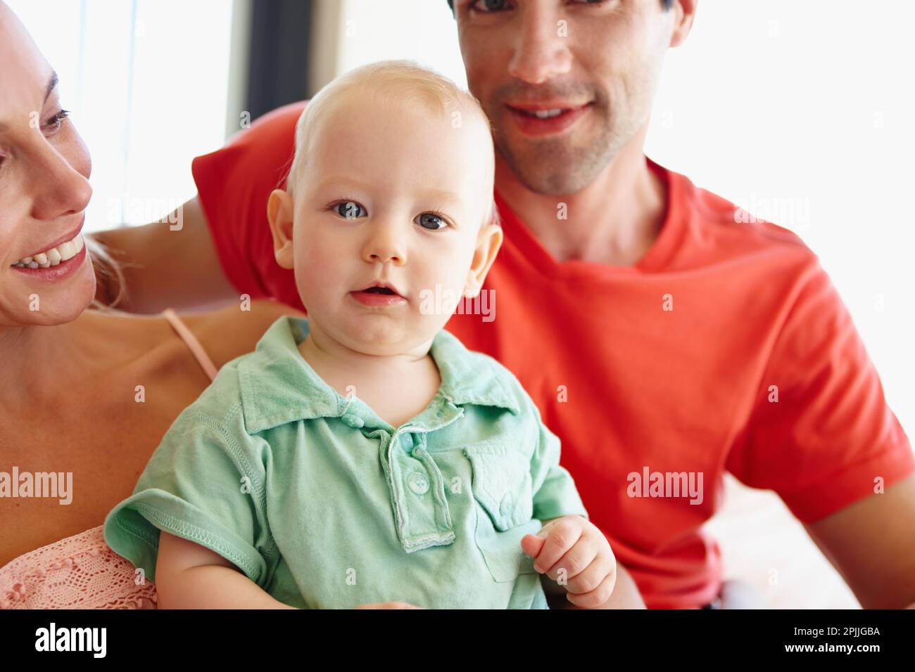 Growing up in a loving family. Portrait of a cute little boy sitting ...
