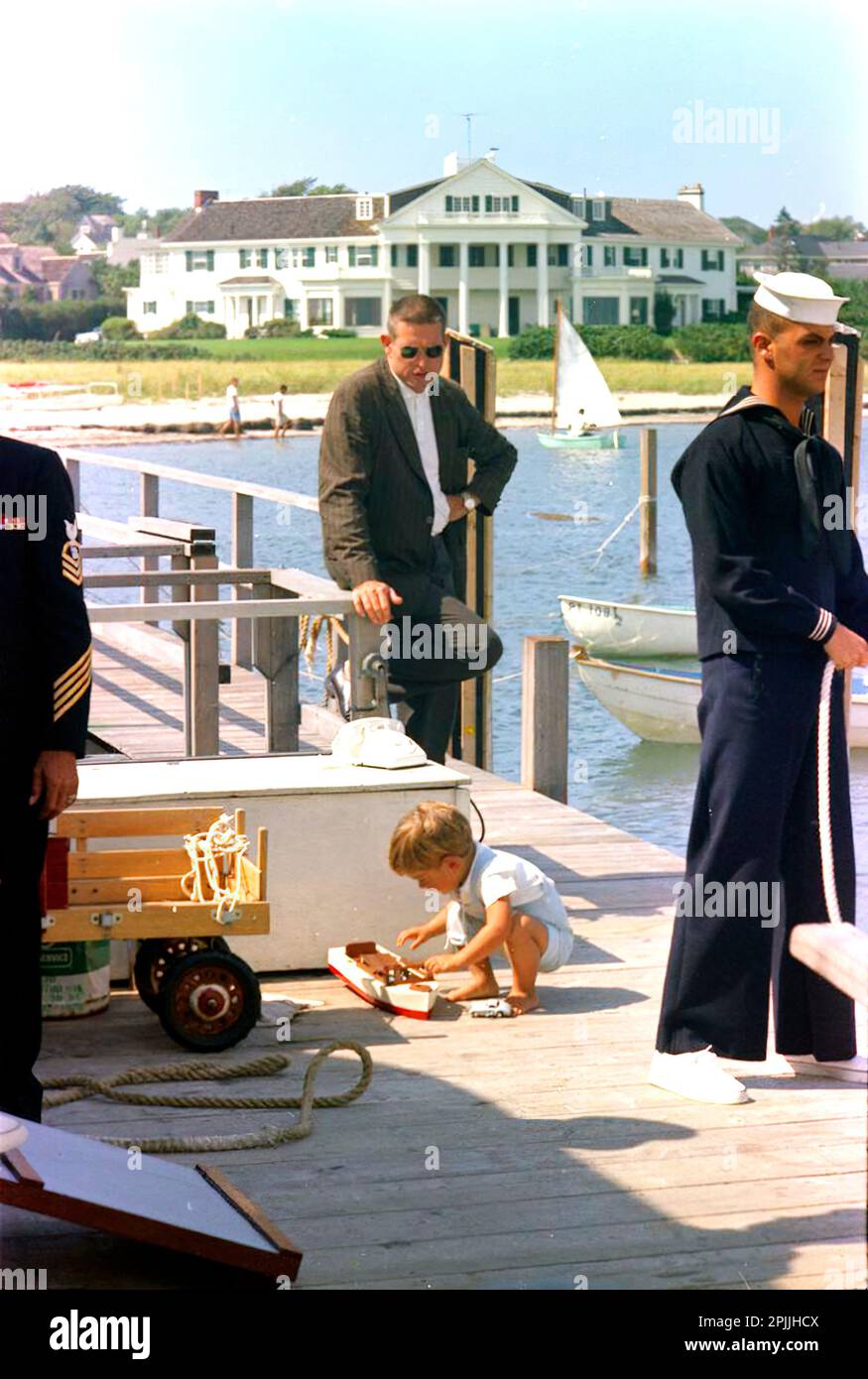 St-C291-18-63 31 August 1963 John F. Kennedy Jr. plays with a toy boat ...