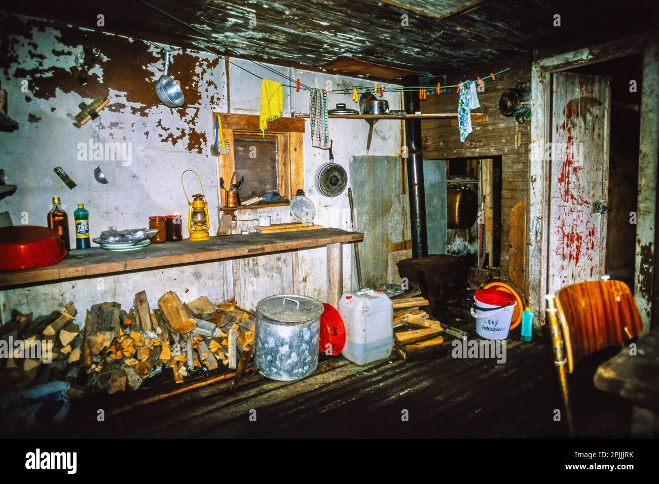 Interior in a old hunting hut in Arctic Stock Photo - Alamy