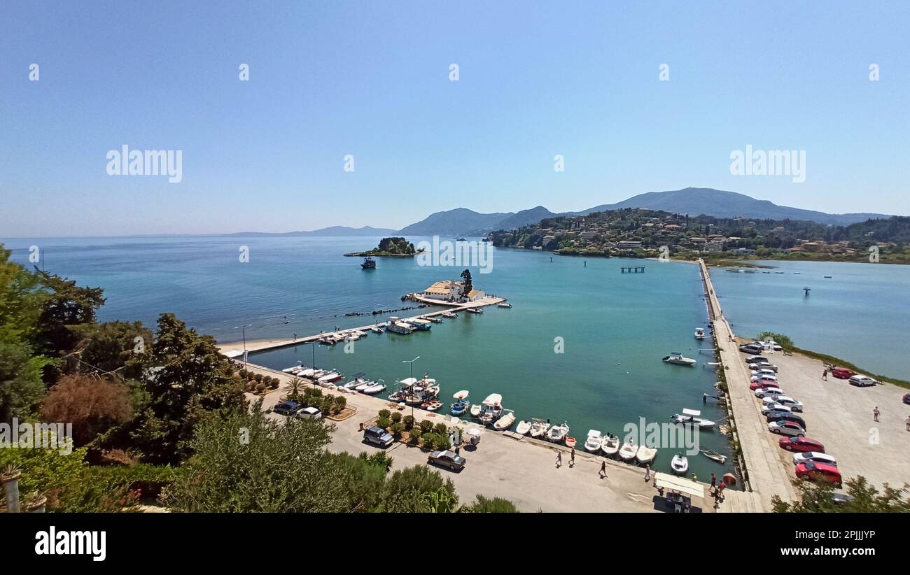 Pontikonisi (background) and Vlacherna Monastery (foreground) in Corfu ...