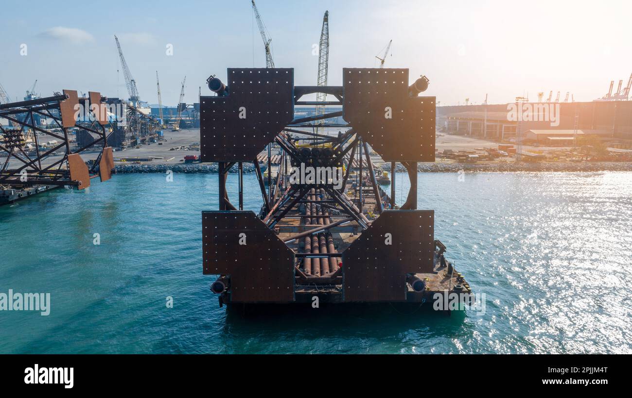 Big Drilling rid on Smart Barge. Construction port at harbor cranes at ...