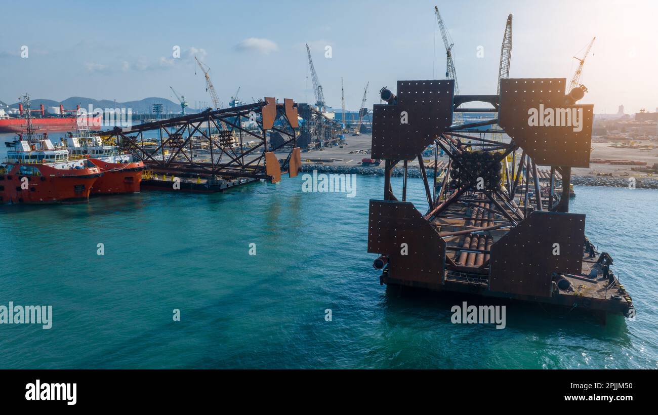 Big Drilling rid on Smart Barge. Construction port at harbor cranes at ...