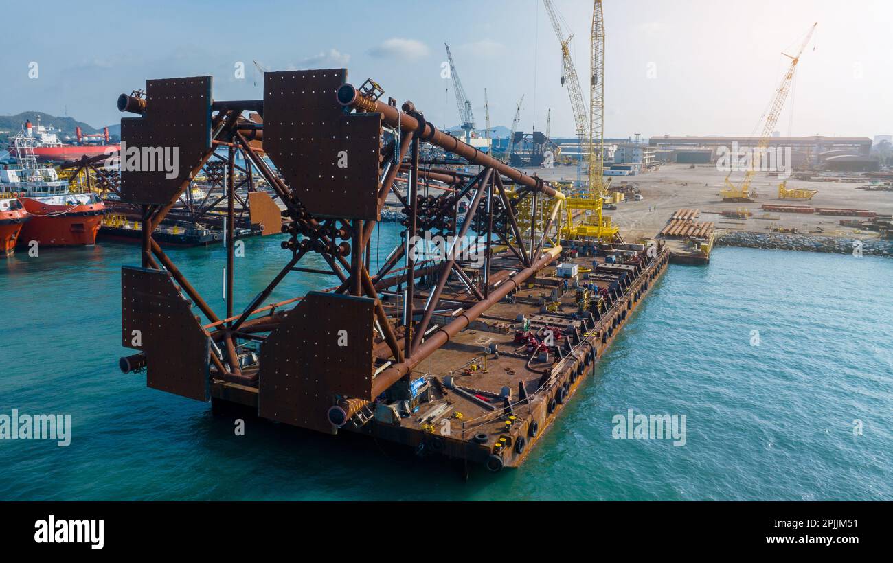 Big Drilling rid on Smart Barge. Construction port at harbor cranes at ...