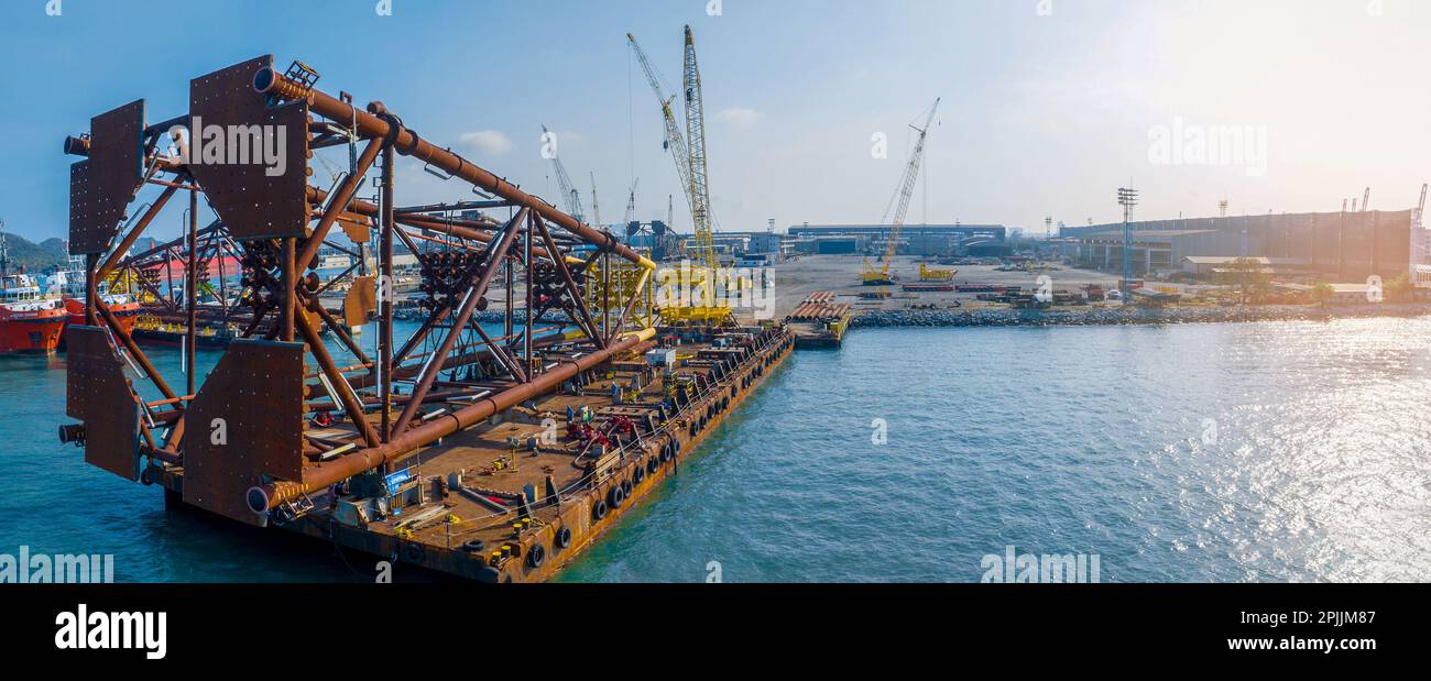 Big Drilling rid on Smart Barge. Construction port at harbor cranes at ...