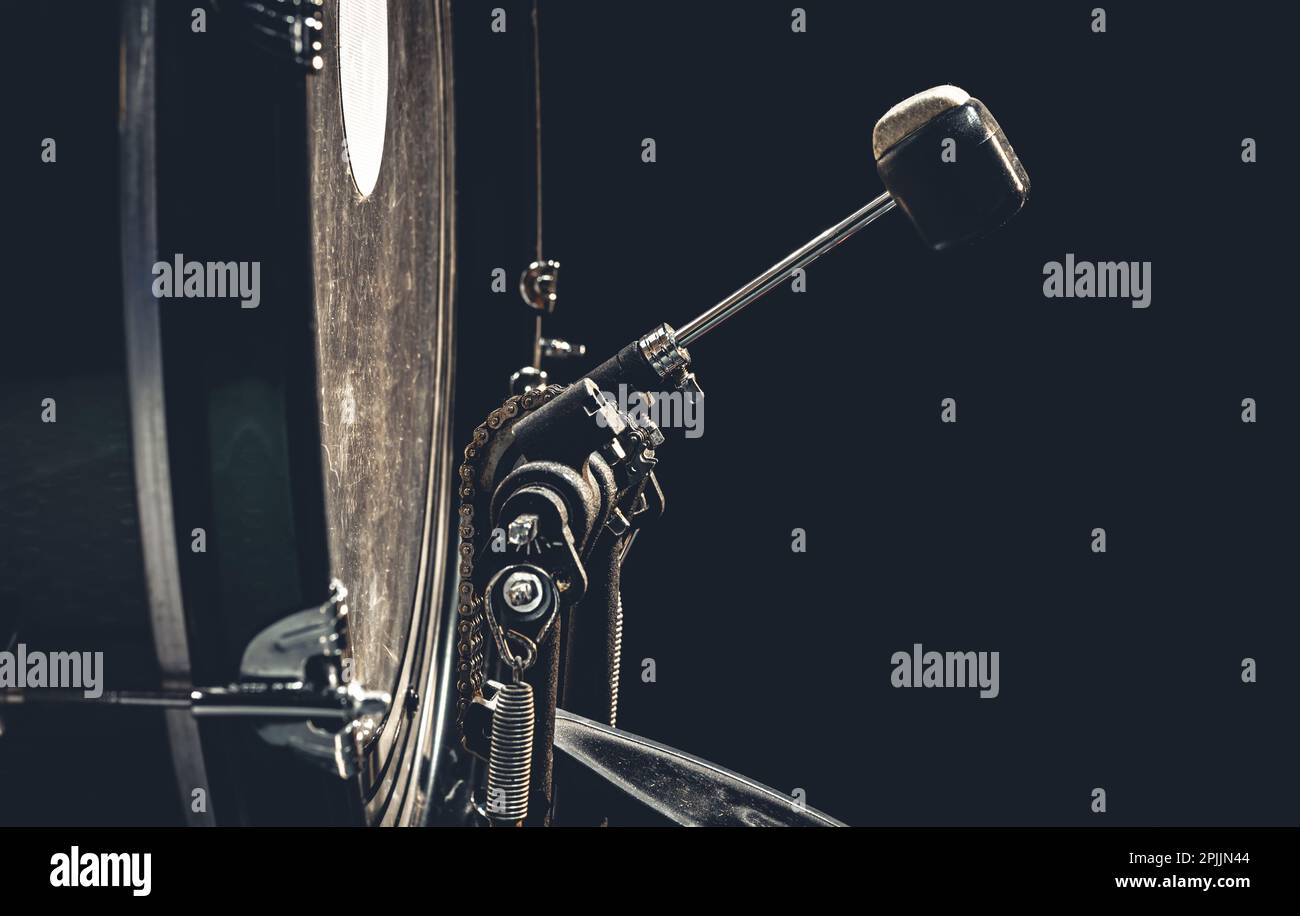 Bass drum with pedal, musical instrument on black background Stock ...