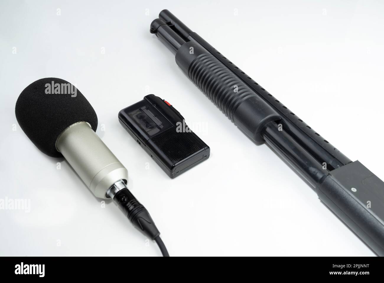 Microphone, recorder device, and gun isolated over white background ...
