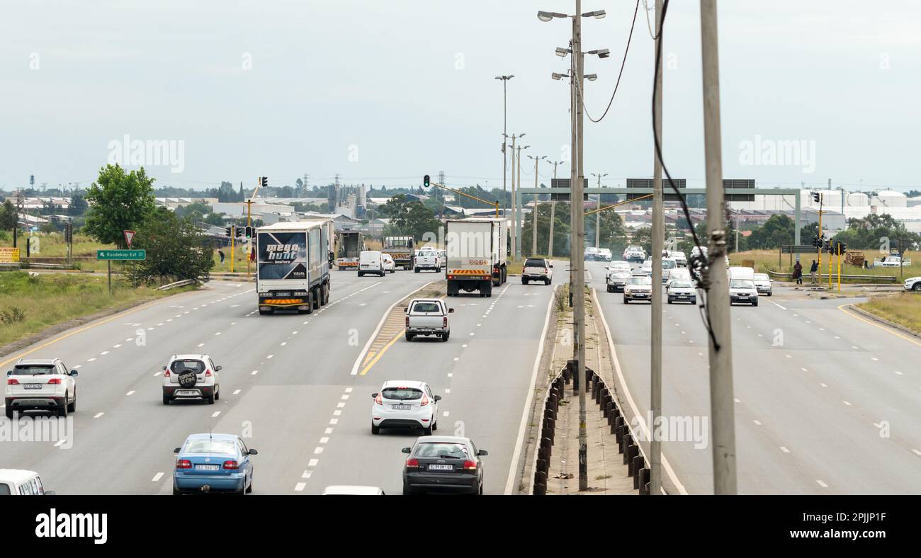view from a bridge, looking down on cars and vehicles, traffic in ...