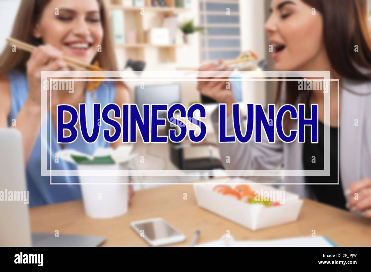 Office employees eating at workplace. Business lunch Stock Photo - Alamy