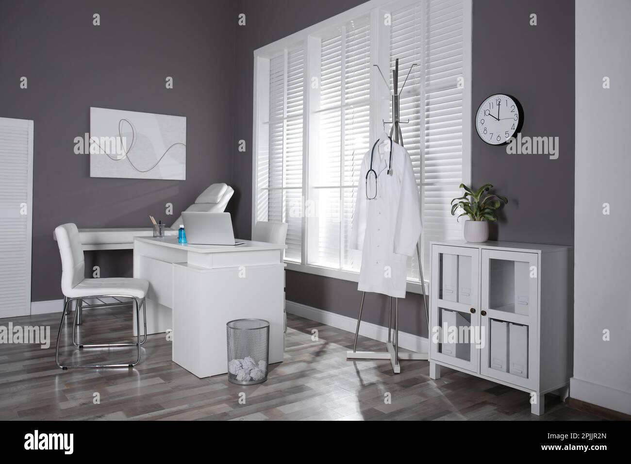 Modern medical office interior with doctor's workplace Stock Photo - Alamy