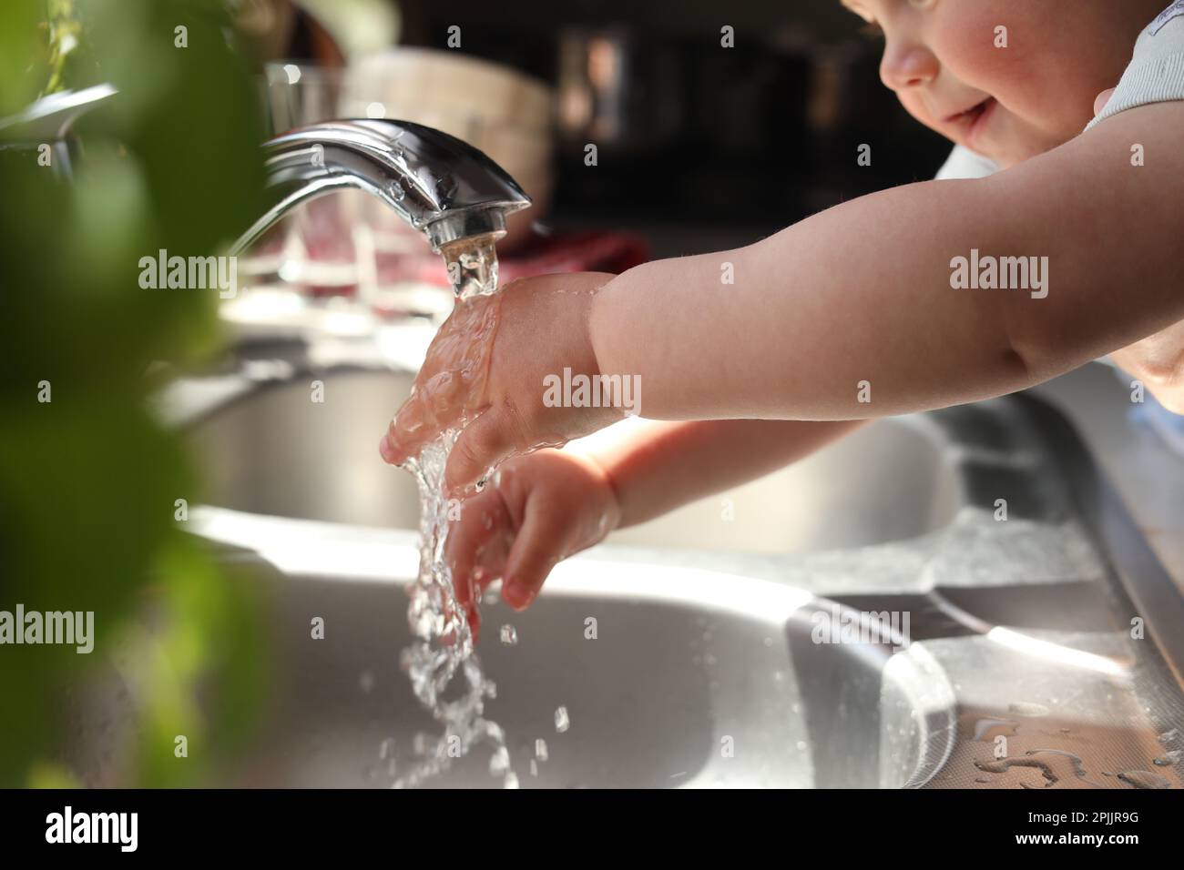 Child washing hands closeup hi-res stock photography and images - Alamy