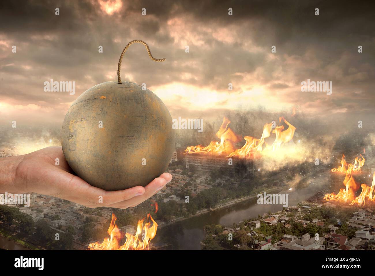 Human hand holding ball bomb with ruined city background Stock Photo ...