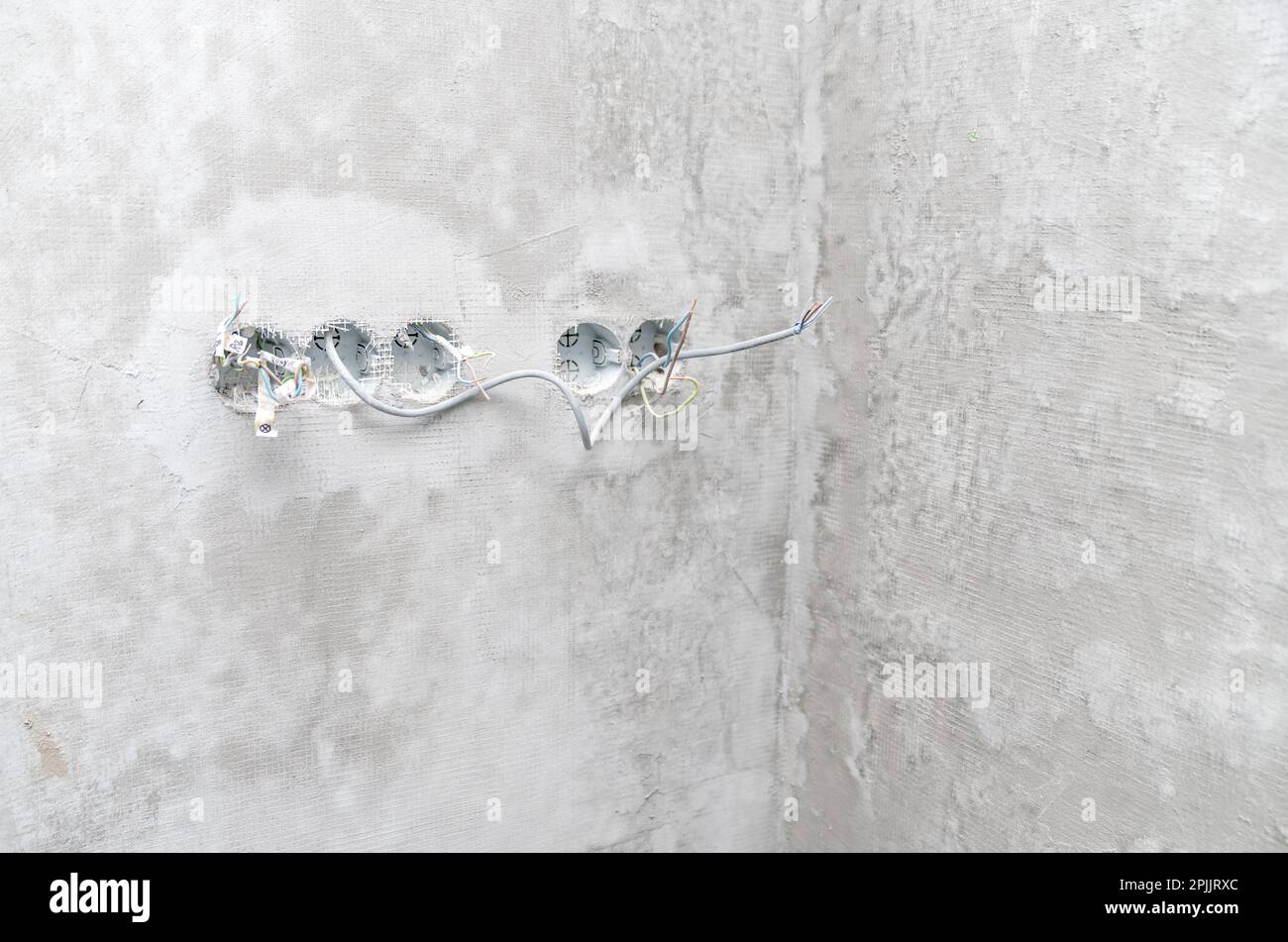 electrical wires in the wall at the construction site Stock Photo - Alamy