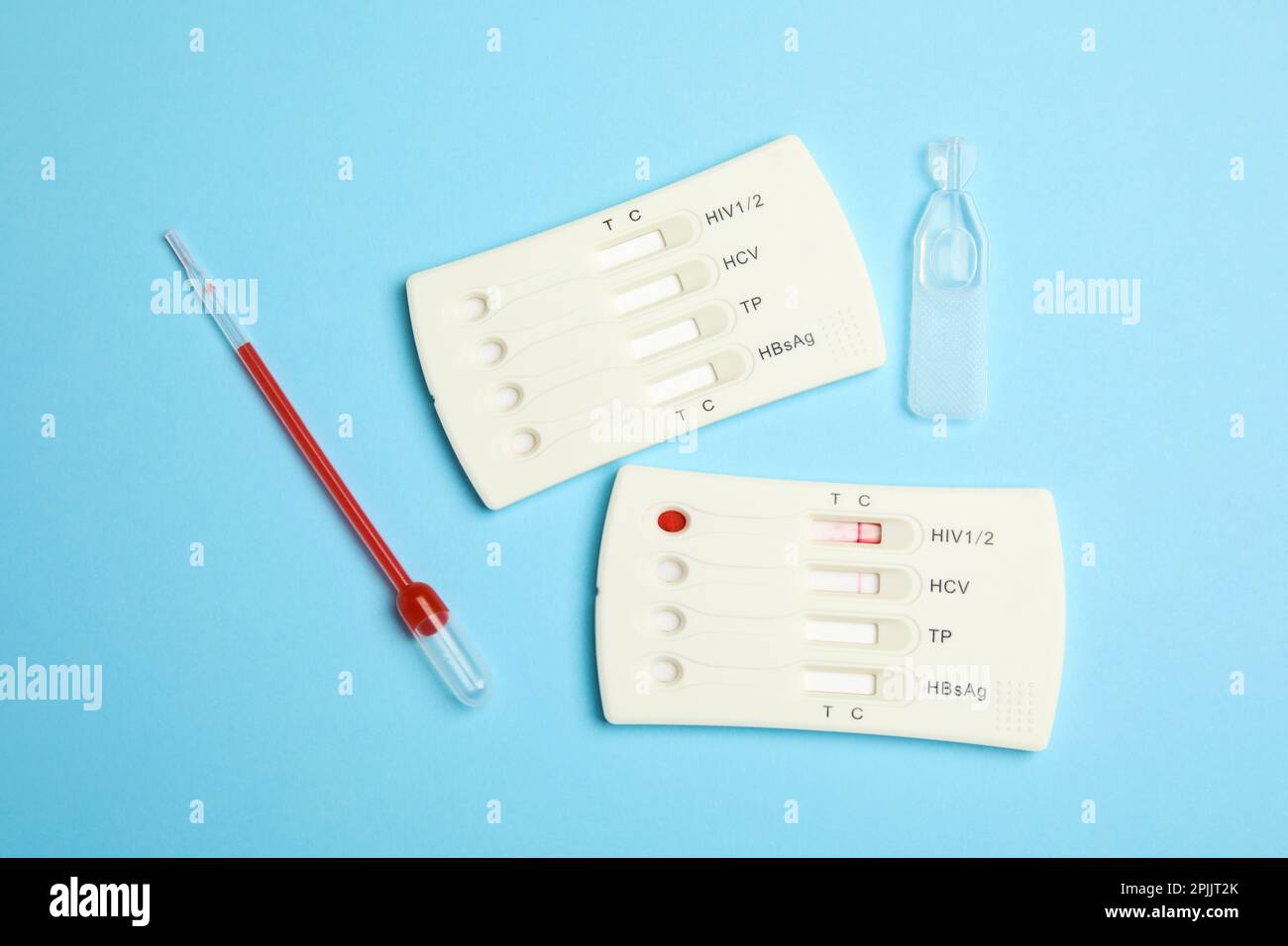 Disposable express hepatitis test kit on light blue background, flat ...