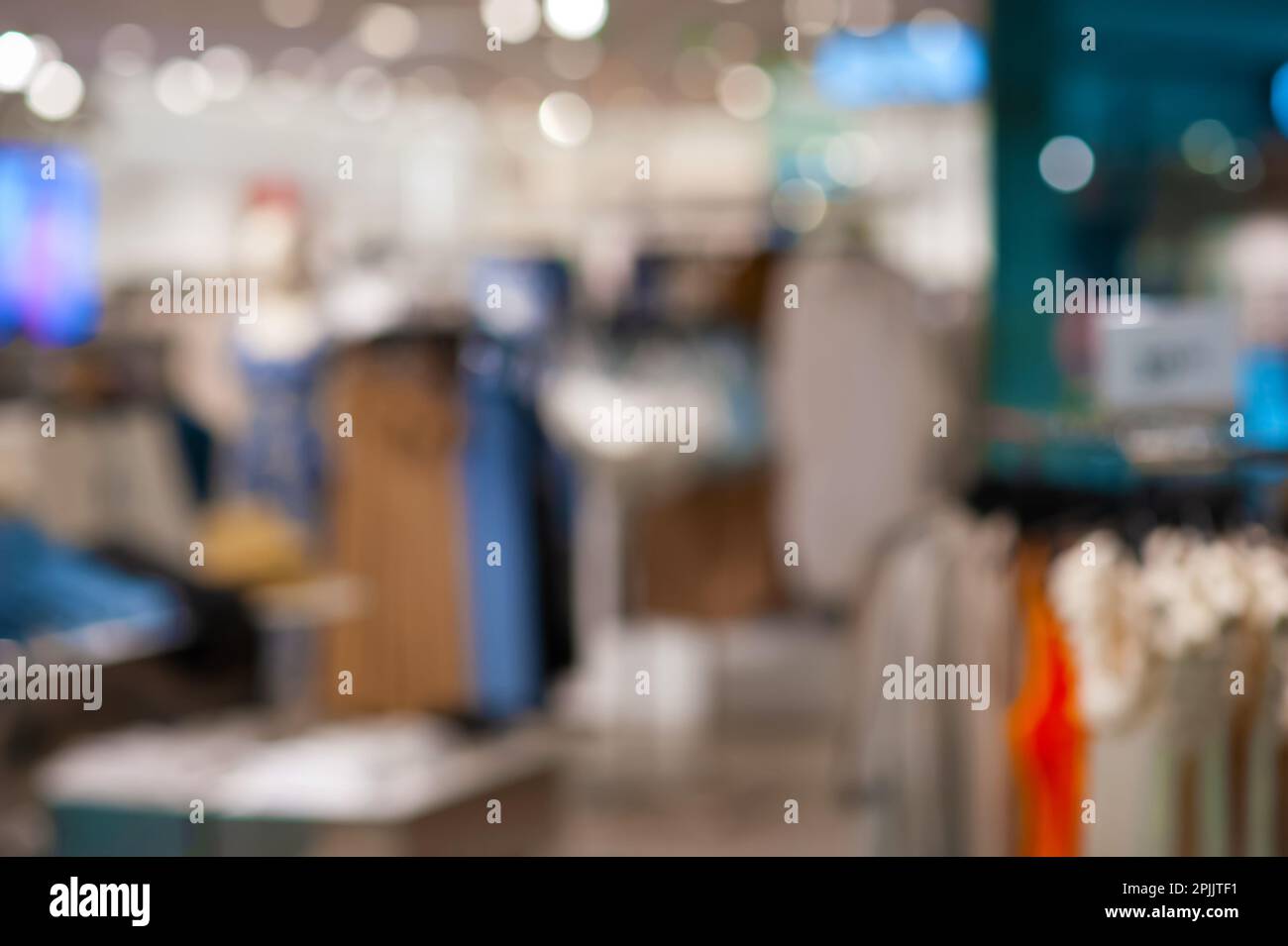 Blurred view of clothing store, bokeh effect Stock Photo - Alamy