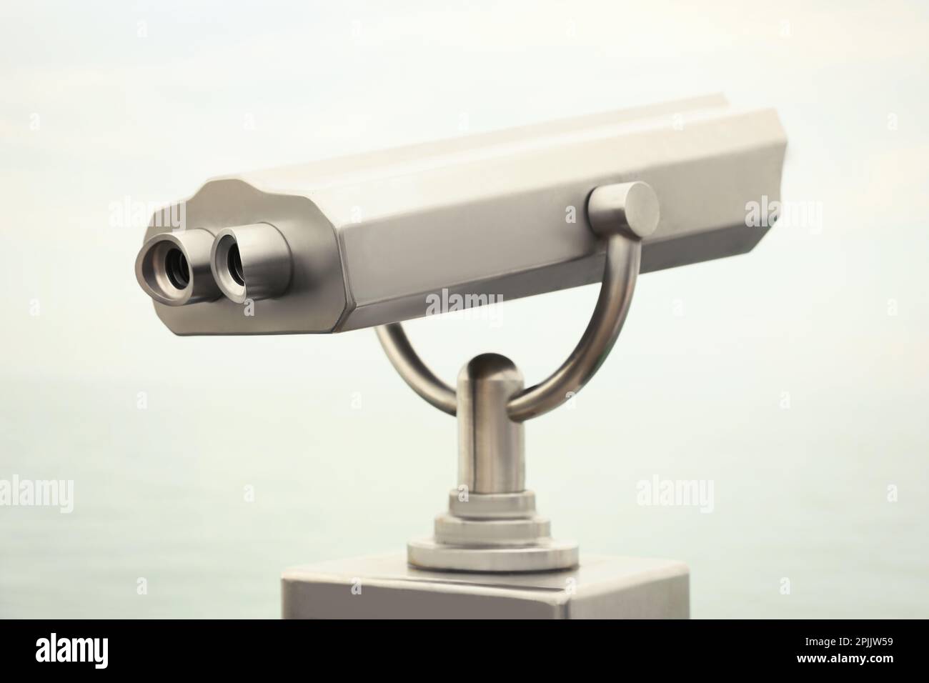 Metal tower viewer installed outdoors. Mounted binoculars Stock Photo ...