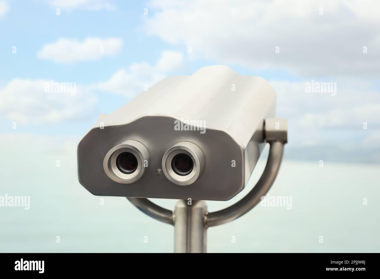 Metal tower viewer installed near sea. Mounted binoculars Stock Photo ...