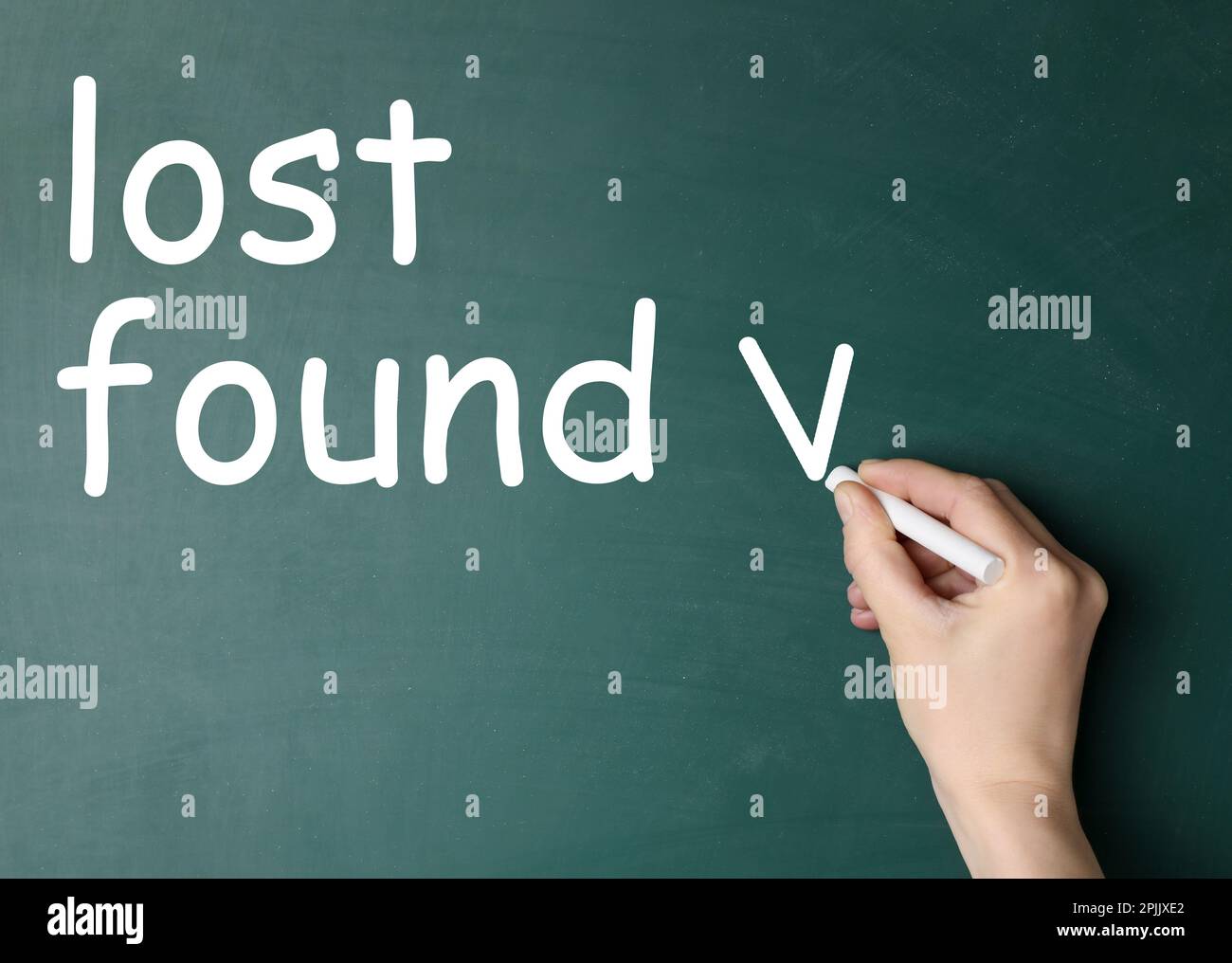 Woman write words Lost and Found on green blackboard, closeup Stock ...