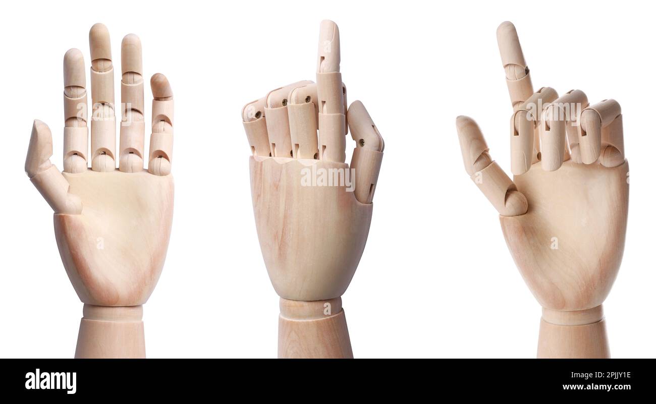Set with wooden hands of mannequins showing different gestures on white ...