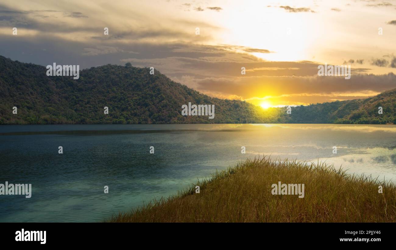 Beautiful lake view with hill and sunset scene background Stock Photo ...