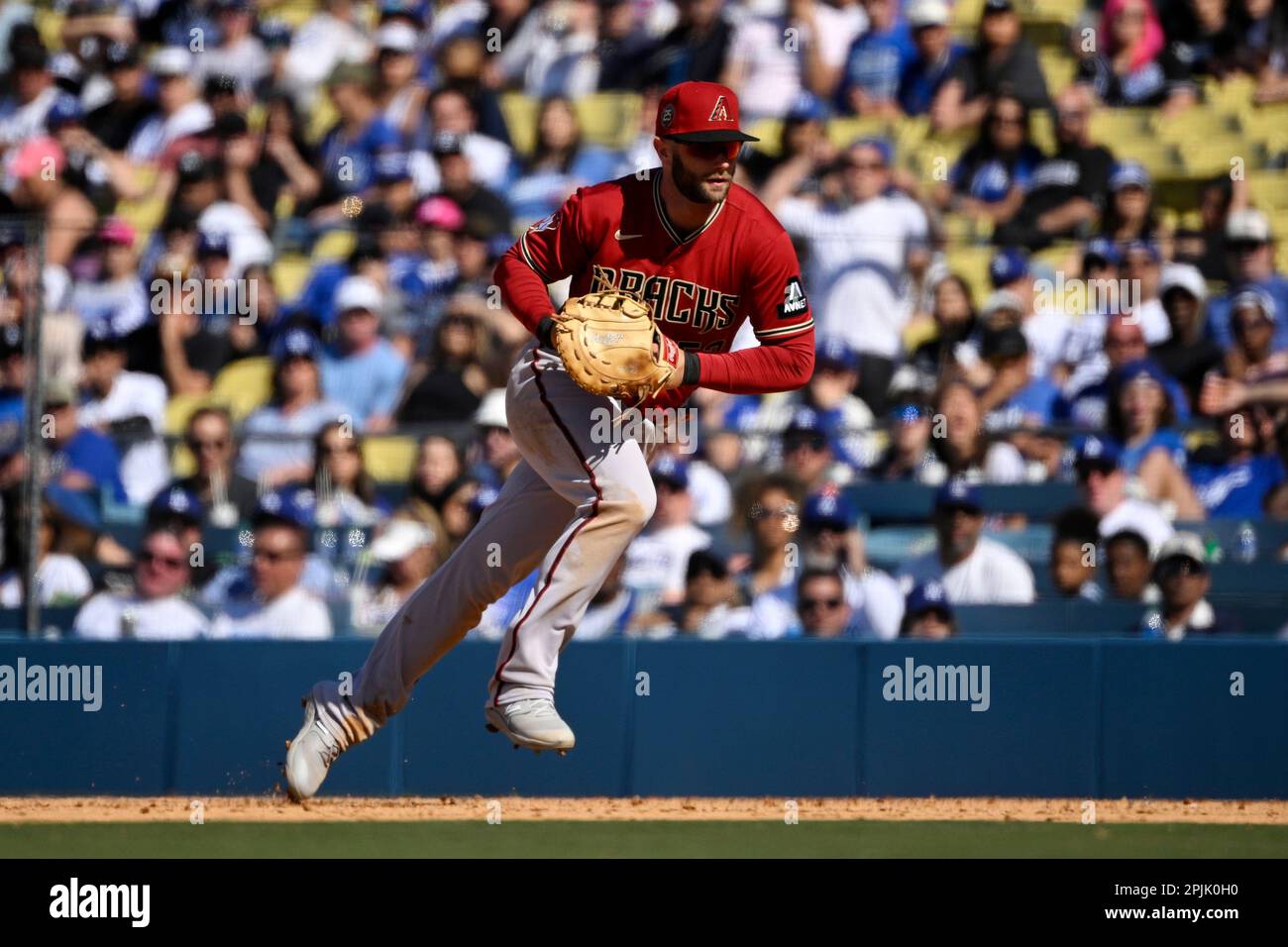Arizona Diamondbacks first baseman Christian Walker moves to throw out ...