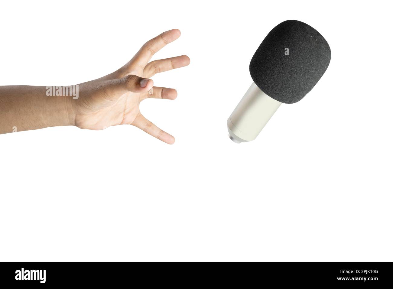 A human hand with a microphone isolated over white background Stock ...
