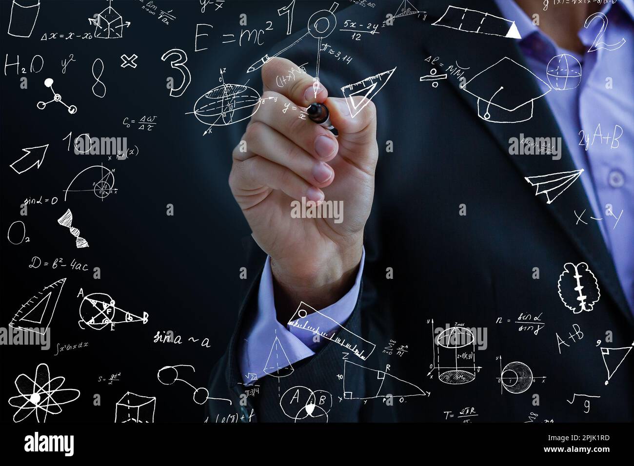 Student or teacher with mathematical and scientific formulas. Concepts ...