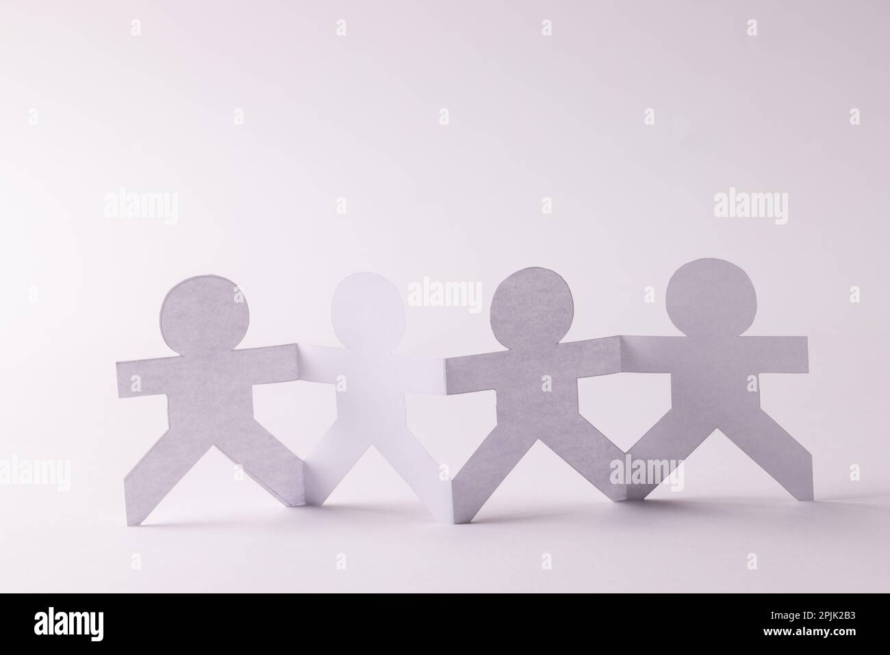 Paper Cut Out People Holding Hands Colorful Paper Cutout People