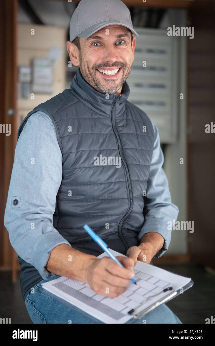 Technician taking machine reading hi-res stock photography and images ...